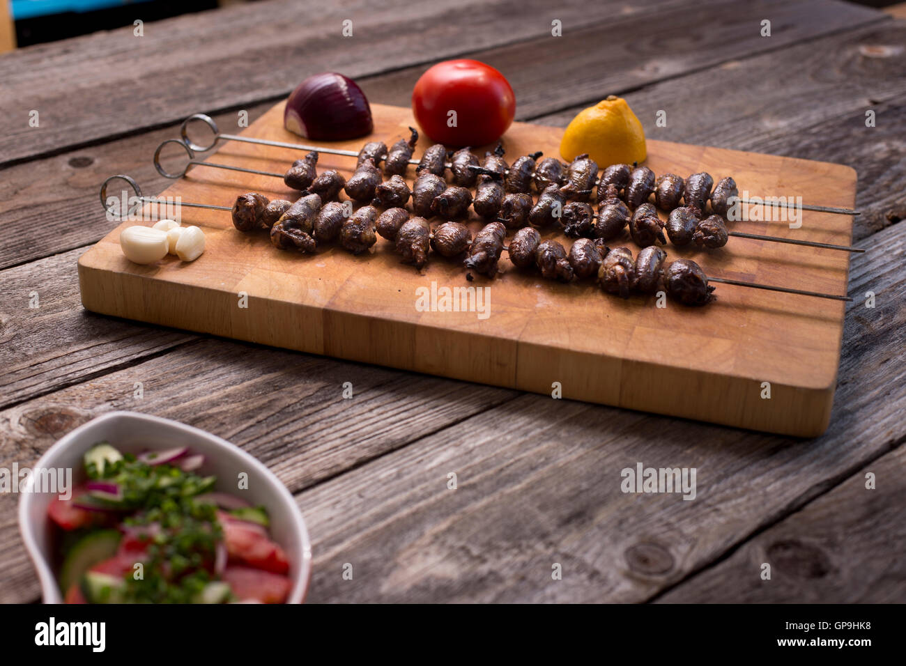 Churrasco, traditional Brazilian barbecue, chicken hearts grilled ...