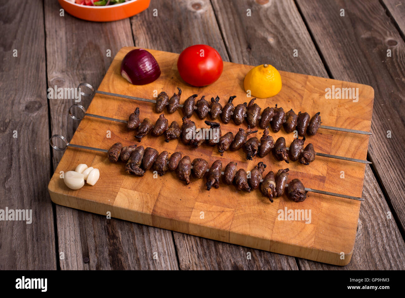 Churrasco, traditional Brazilian barbecue, chicken hearts grilled ...