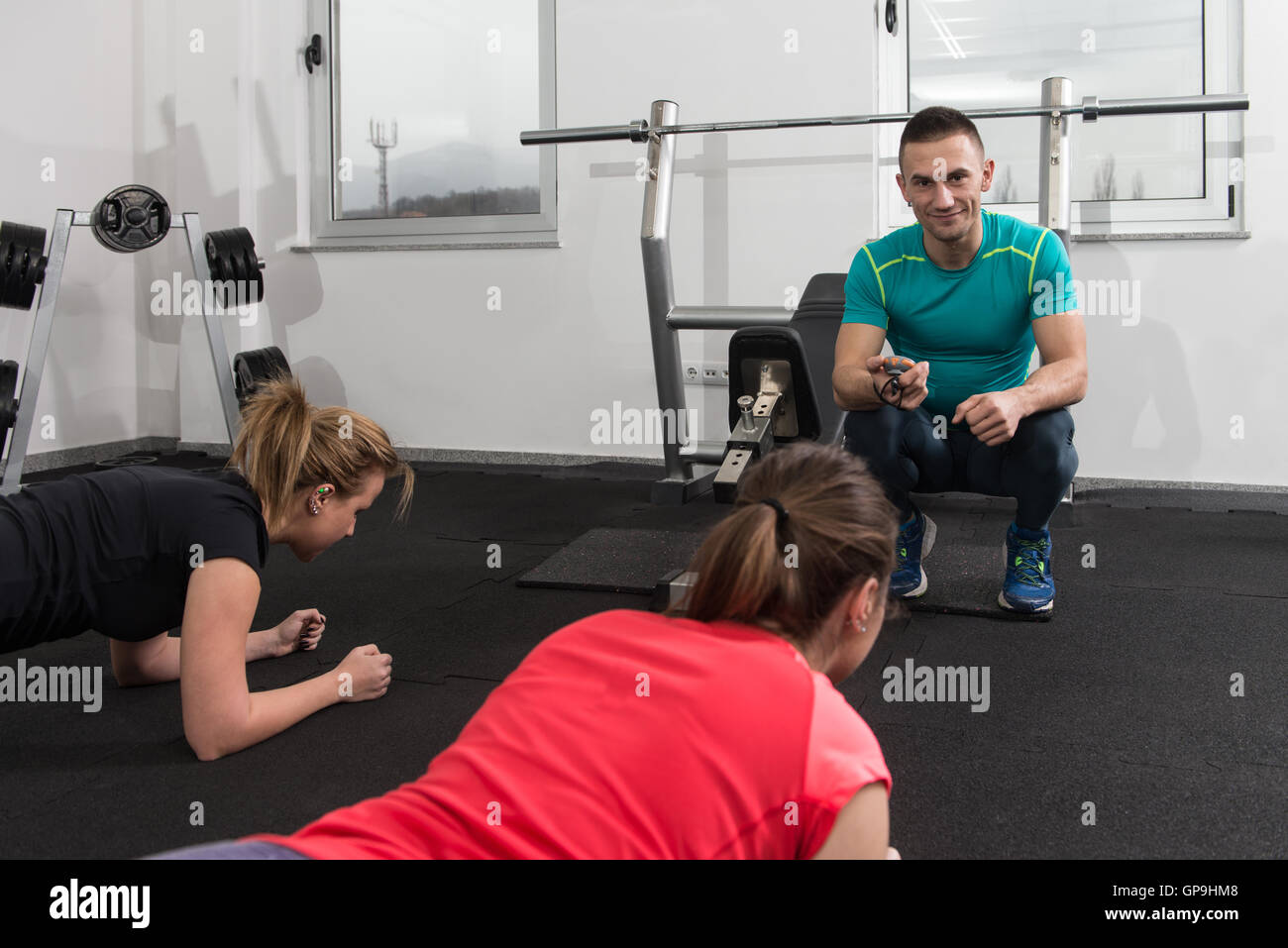 Group Of Friends Exercising Together During A Gym Class Stock Photo - Alamy