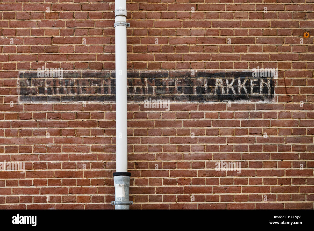 Faded sign on a wall in Amsterdam Holland Netherlands Stock Photo - Alamy