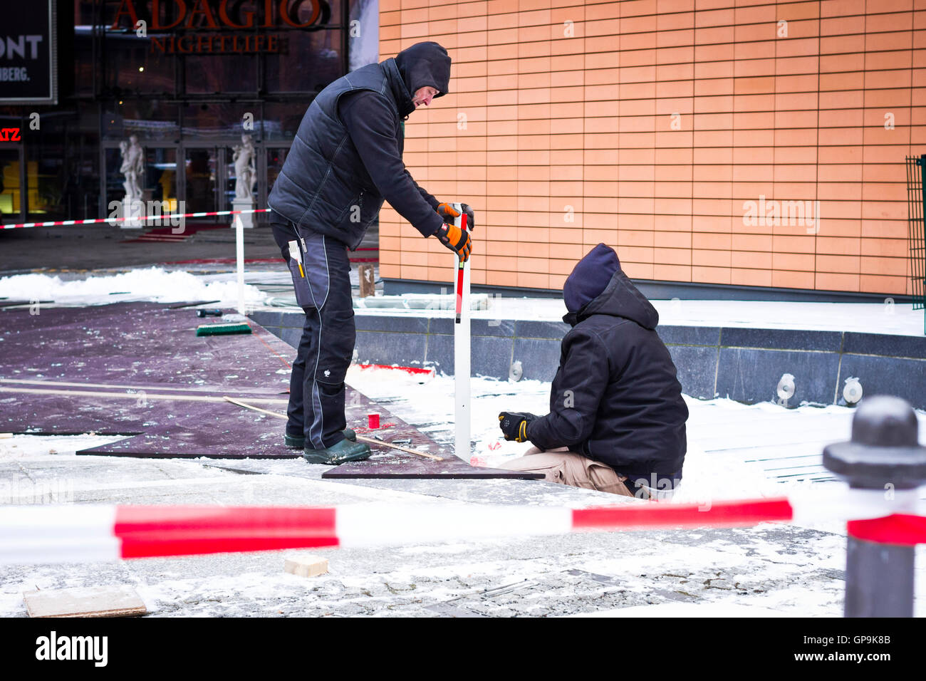 Men working on a pre-Berlinale construction site outside the Potsdamer ...