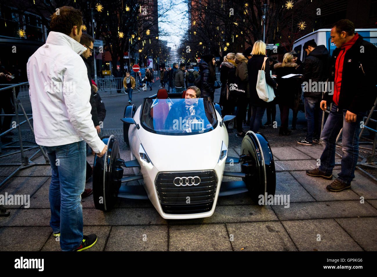 A man in an Audi concept car gets stuck on the pavement outside the ...