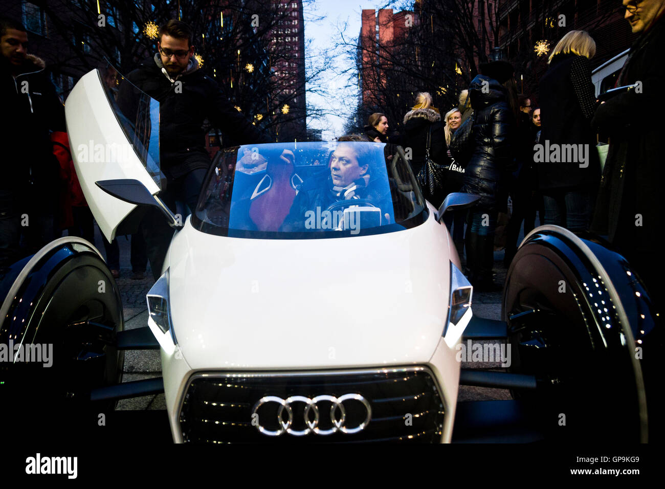 A man in an Audi concept car gets stuck on the pavement outside the ...