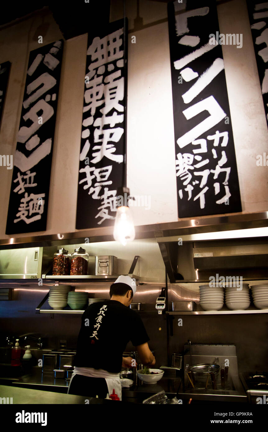 A chef preparing food at a chilli ramen restaurant in Tokyo, Japan ...