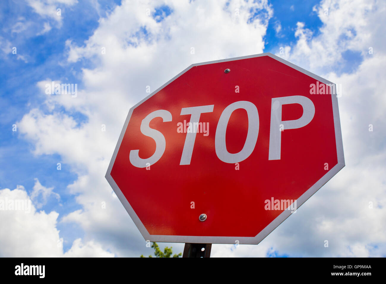Cars stopping stop sign hi-res stock photography and images - Alamy