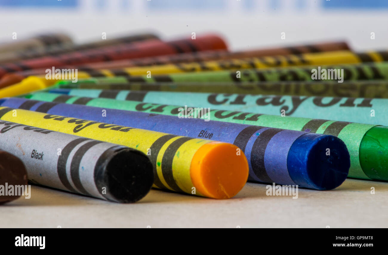Blue crayon center Stock Photo - Alamy