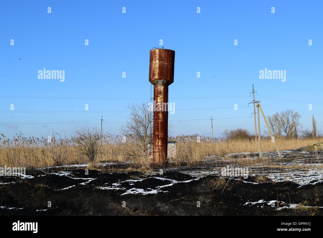 Rusty water tower Stock Photo - Alamy