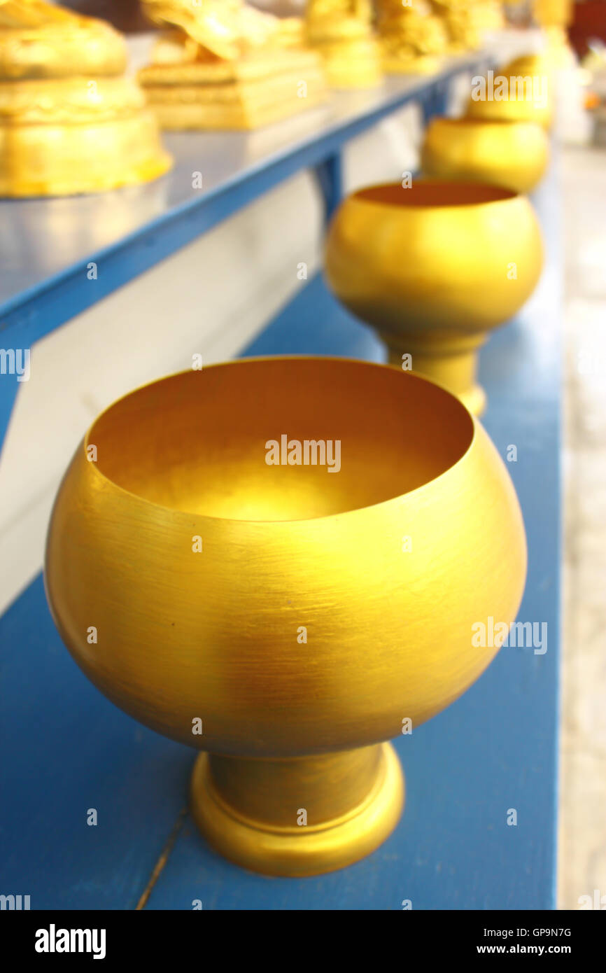 The golden monk's alms bowl Stock Photo - Alamy