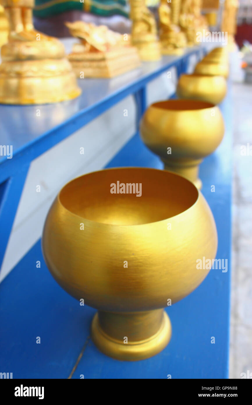 The golden monk's alms bowl Stock Photo - Alamy