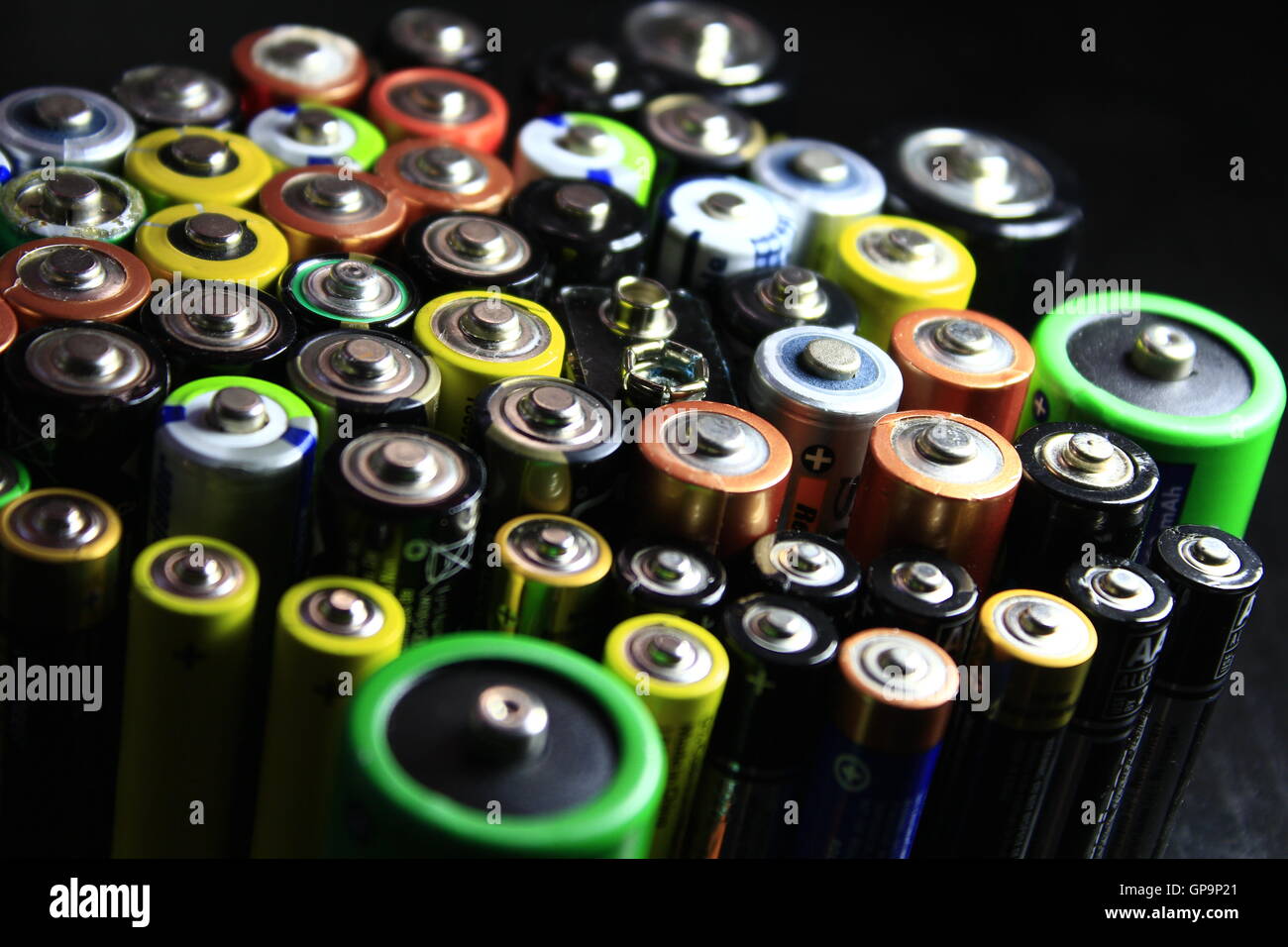 Batteries of different types and colors Stock Photo - Alamy