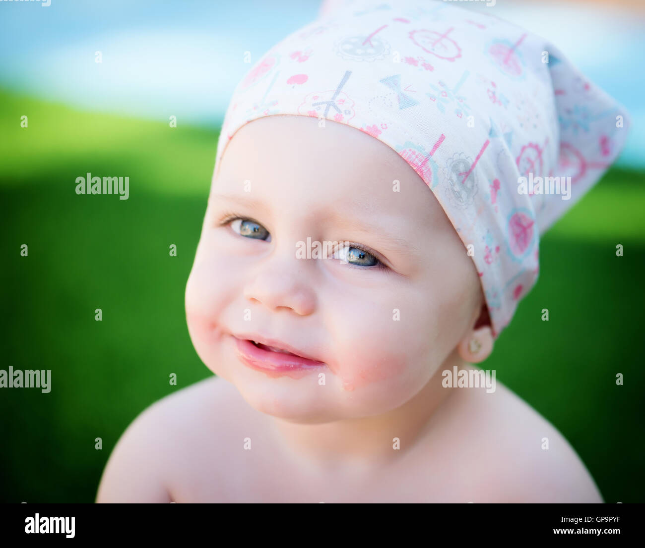 Cute joyful baby girl on the nature background Stock Photo - Alamy