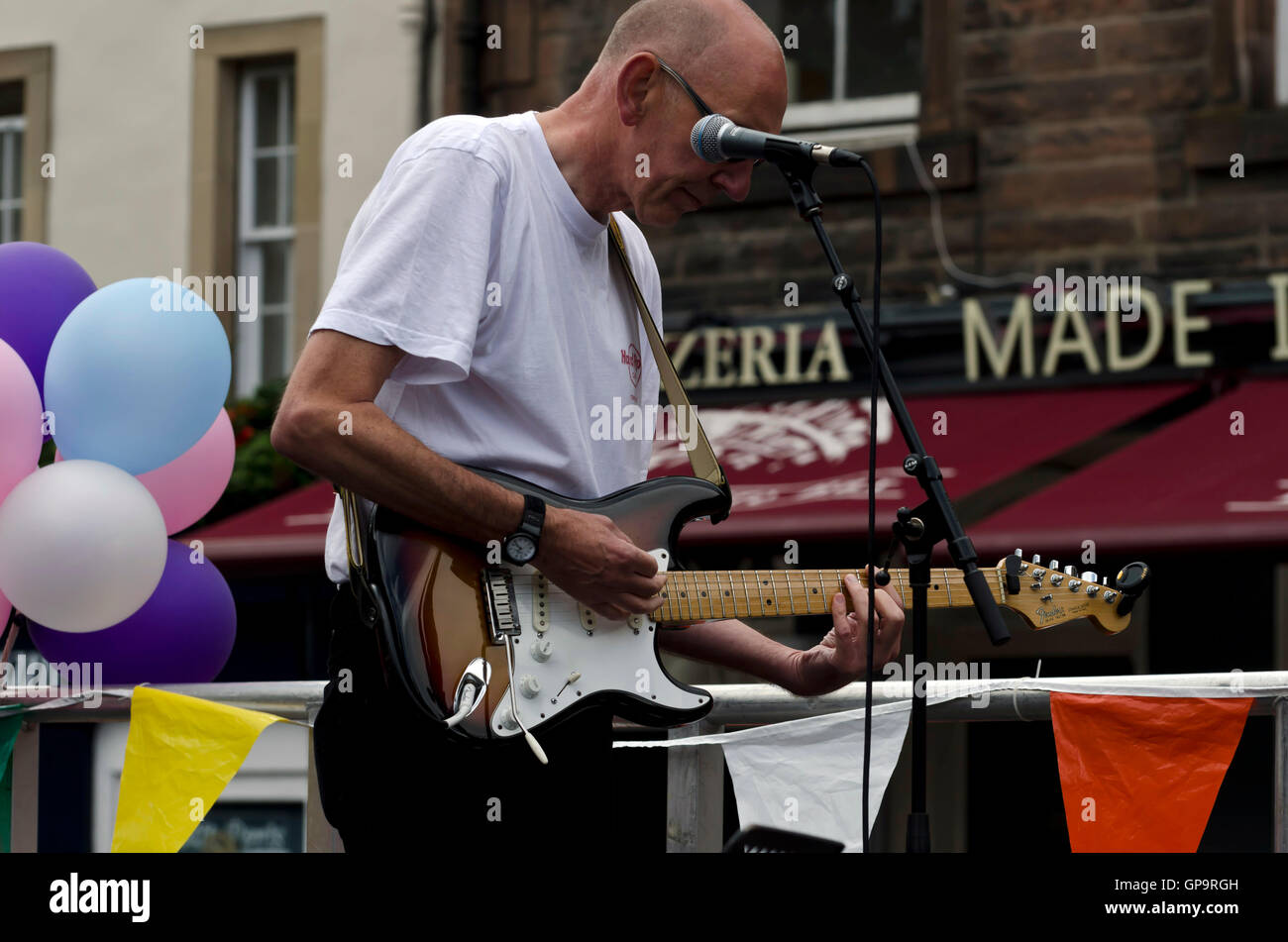 Alan Kyle, the guitarist with the band Lights Out by Nine, taking part ...