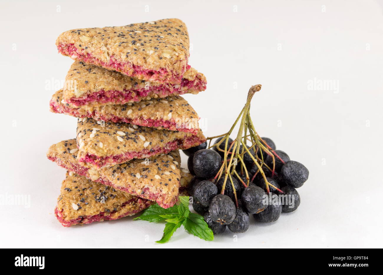 Sweet integral cookies with aronia fruit on a table Stock Photo - Alamy