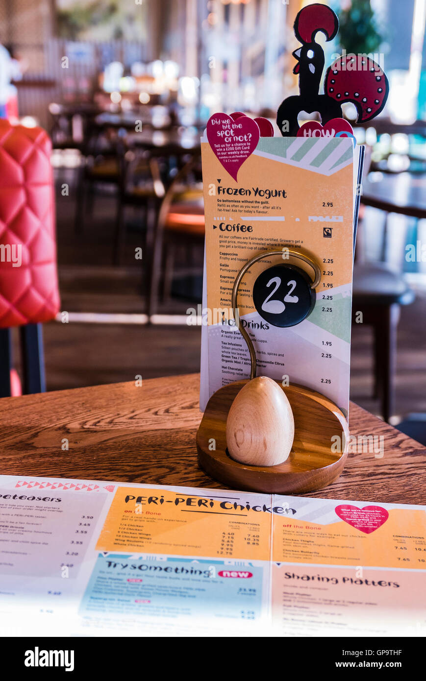 Menu on the table in a Nando's restaurant Stock Photo - Alamy