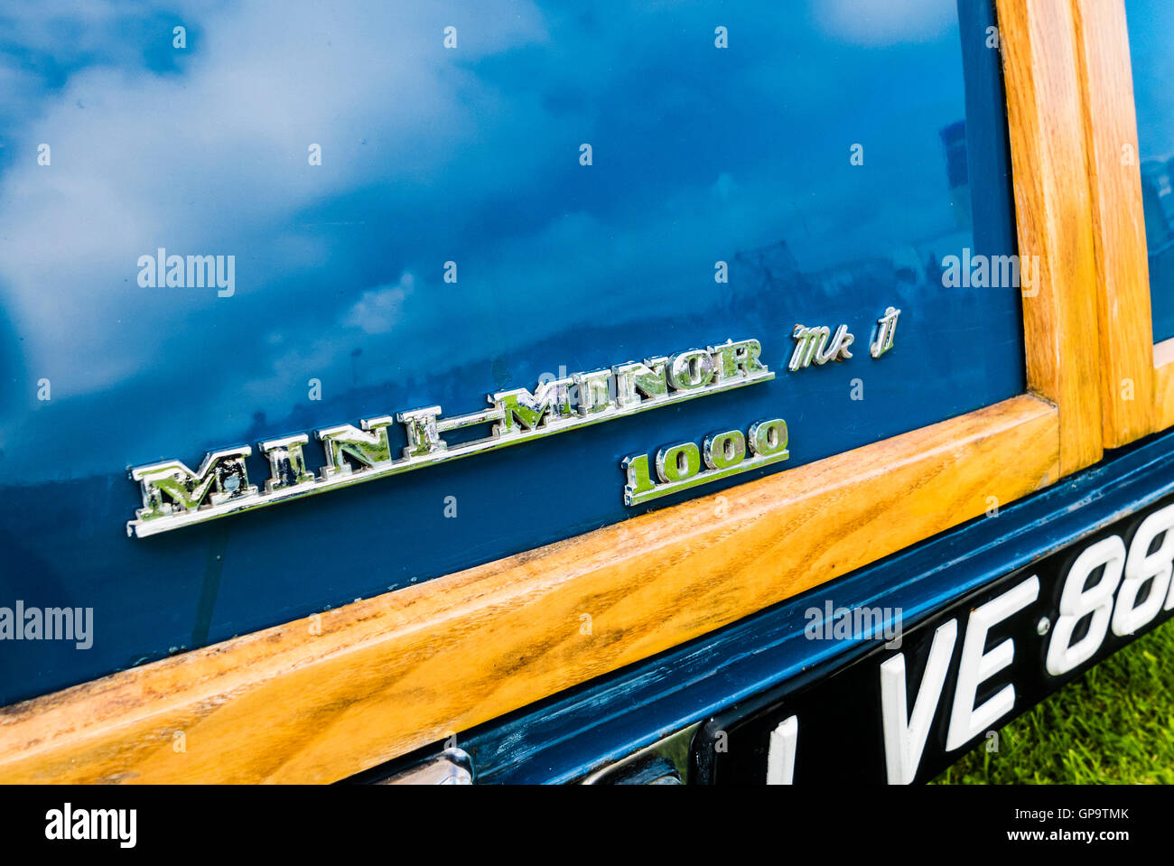 Badge on the rear door of an Austin Mini Minor Mk II 1000cc at a Mini ...