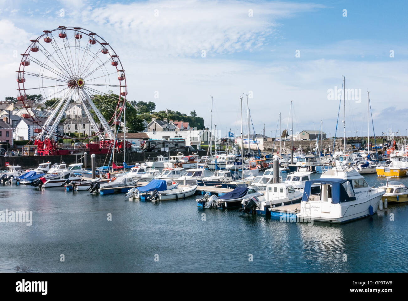 Ballycastle harbour and marina, Northern Ireland, with a ferris wheel ...
