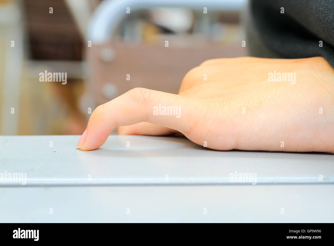 little finger on the table Stock Photo - Alamy