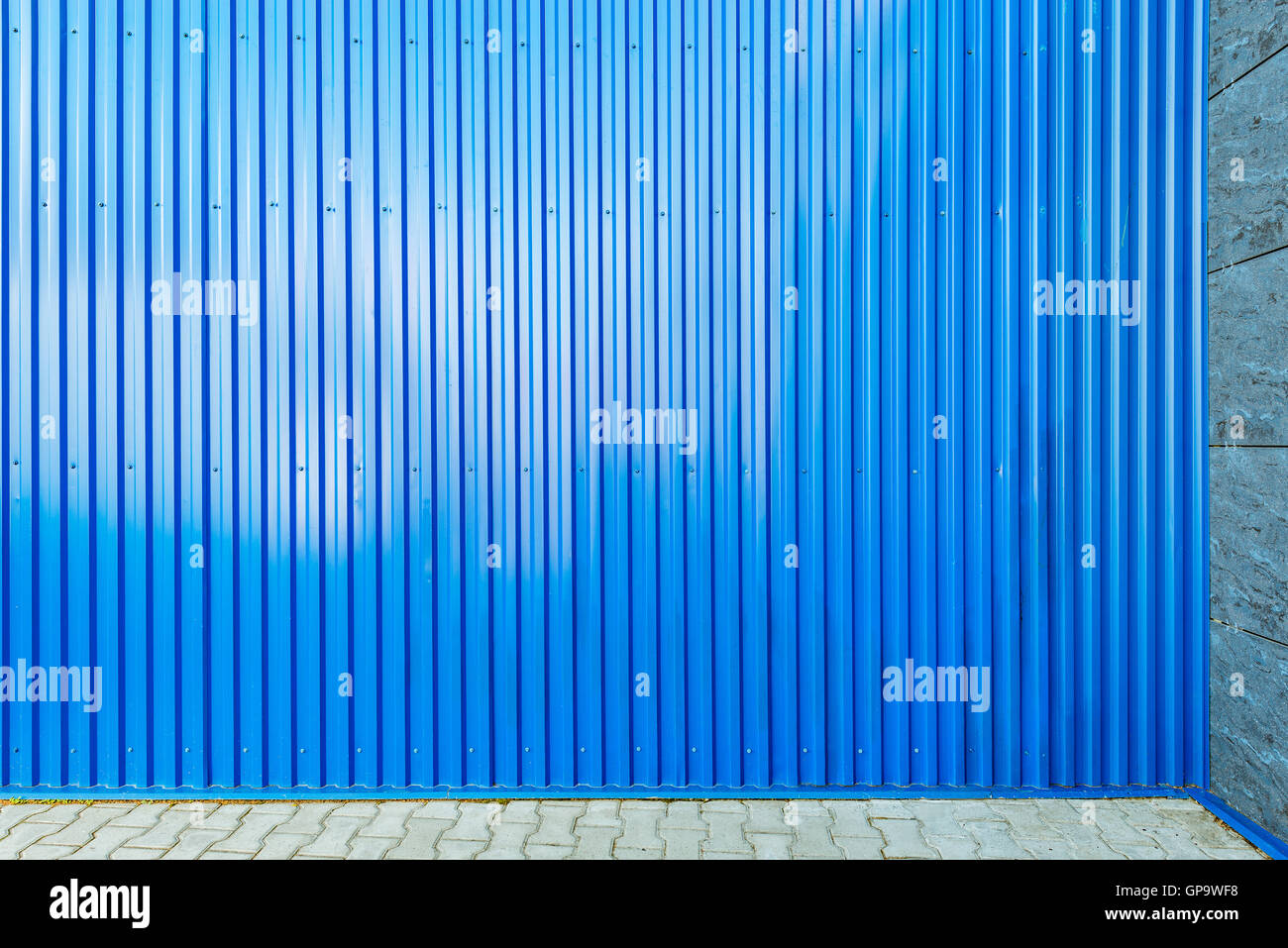 Blue corrugated metal fence background on the floor Stock Photo - Alamy
