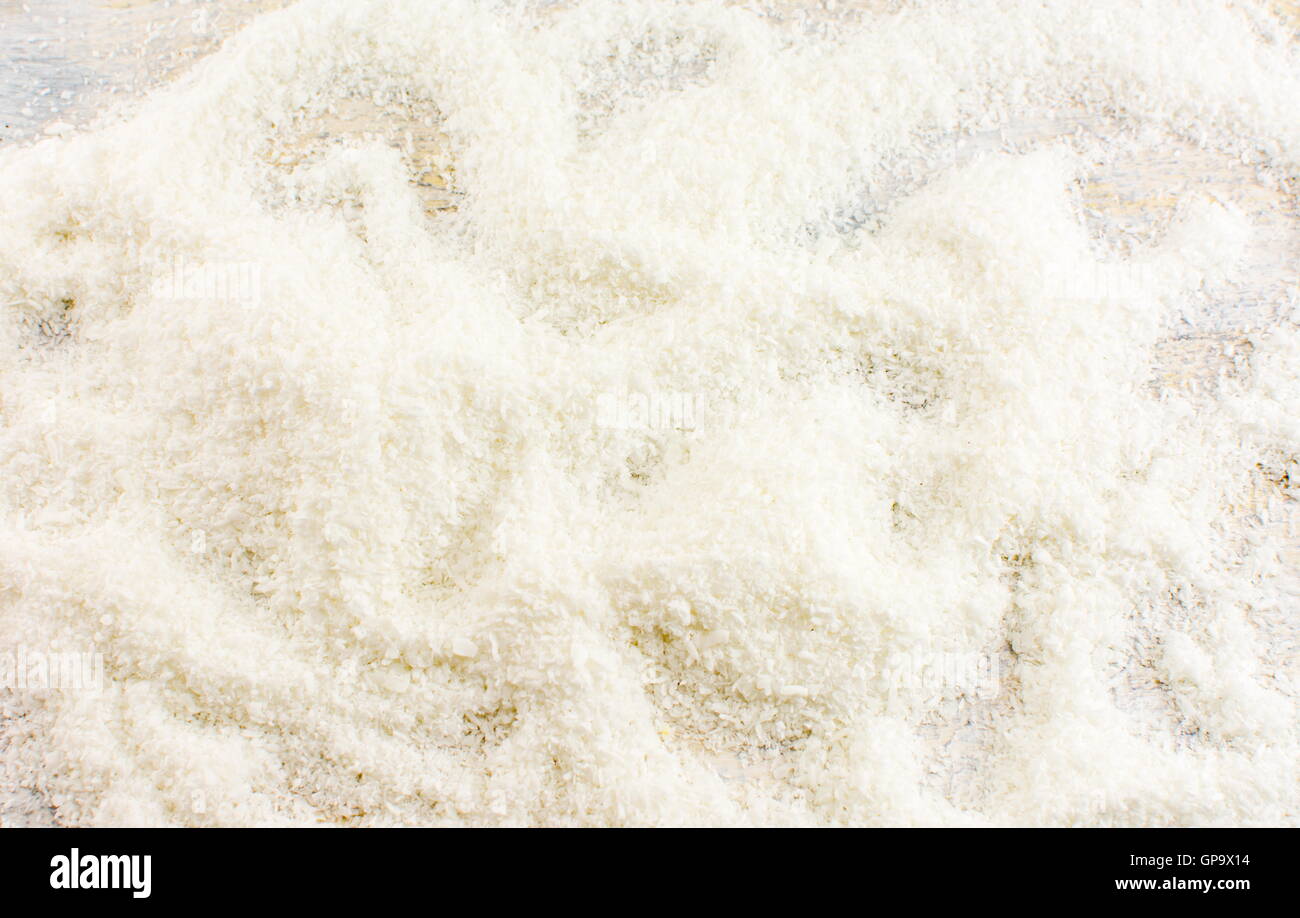 Coconut powder on a pile background Stock Photo - Alamy