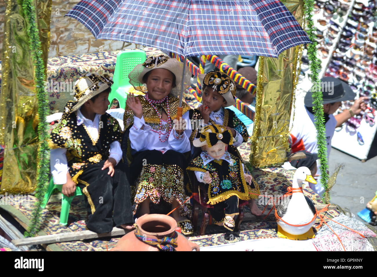 Three kids wearing a costume in a traditional parade Stock Photo - Alamy