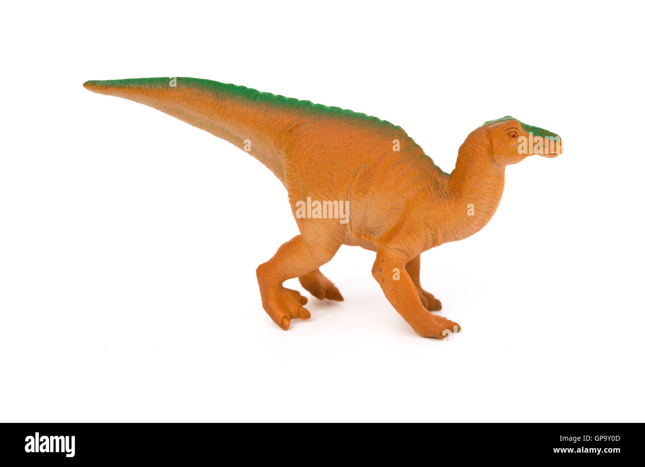 side view brown plastic Edmontosaurus toy on a white background Stock ...