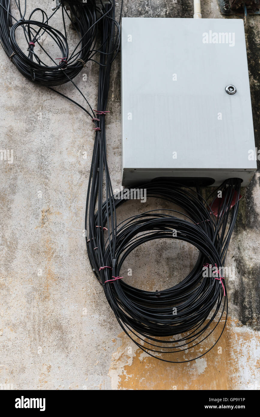distribution box of fiber cables on wall Stock Photo - Alamy