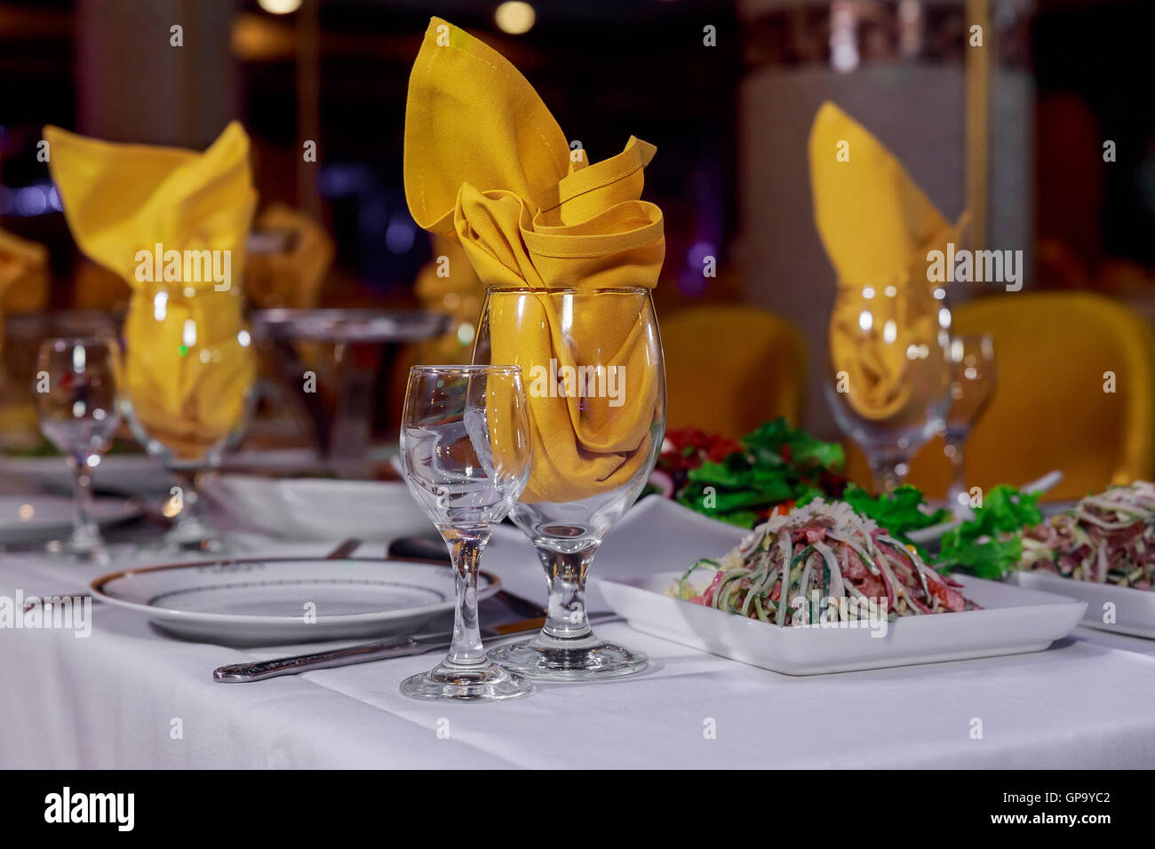 Beautiful served table for wedding or other celebration in restaurant table decorated for ...