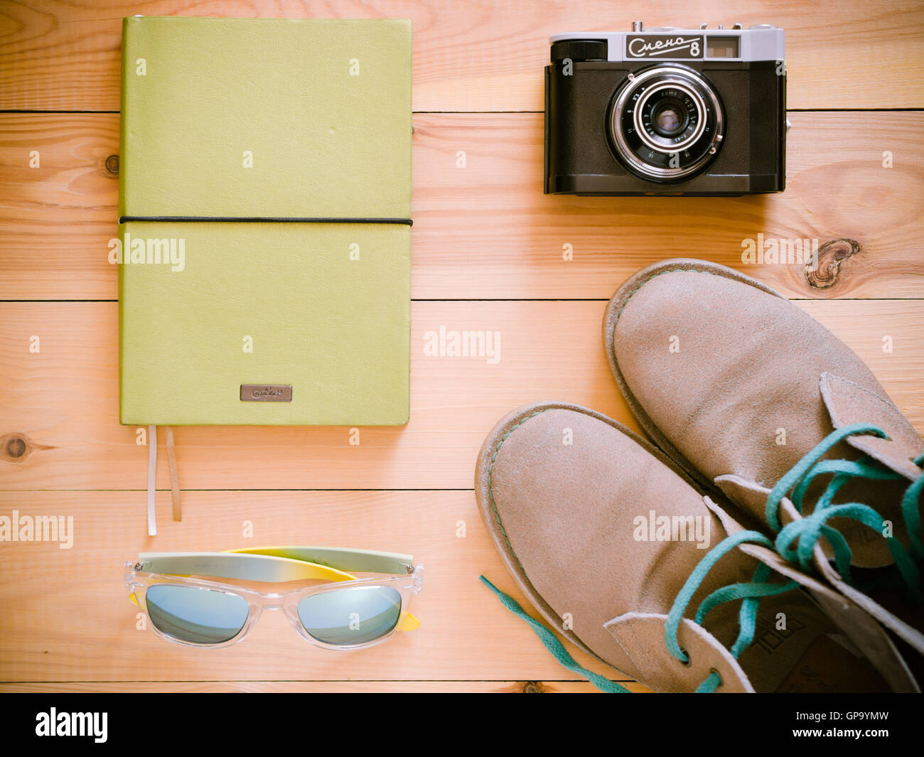 top view set with old camera, boots, sunglasses Stock Photo - Alamy