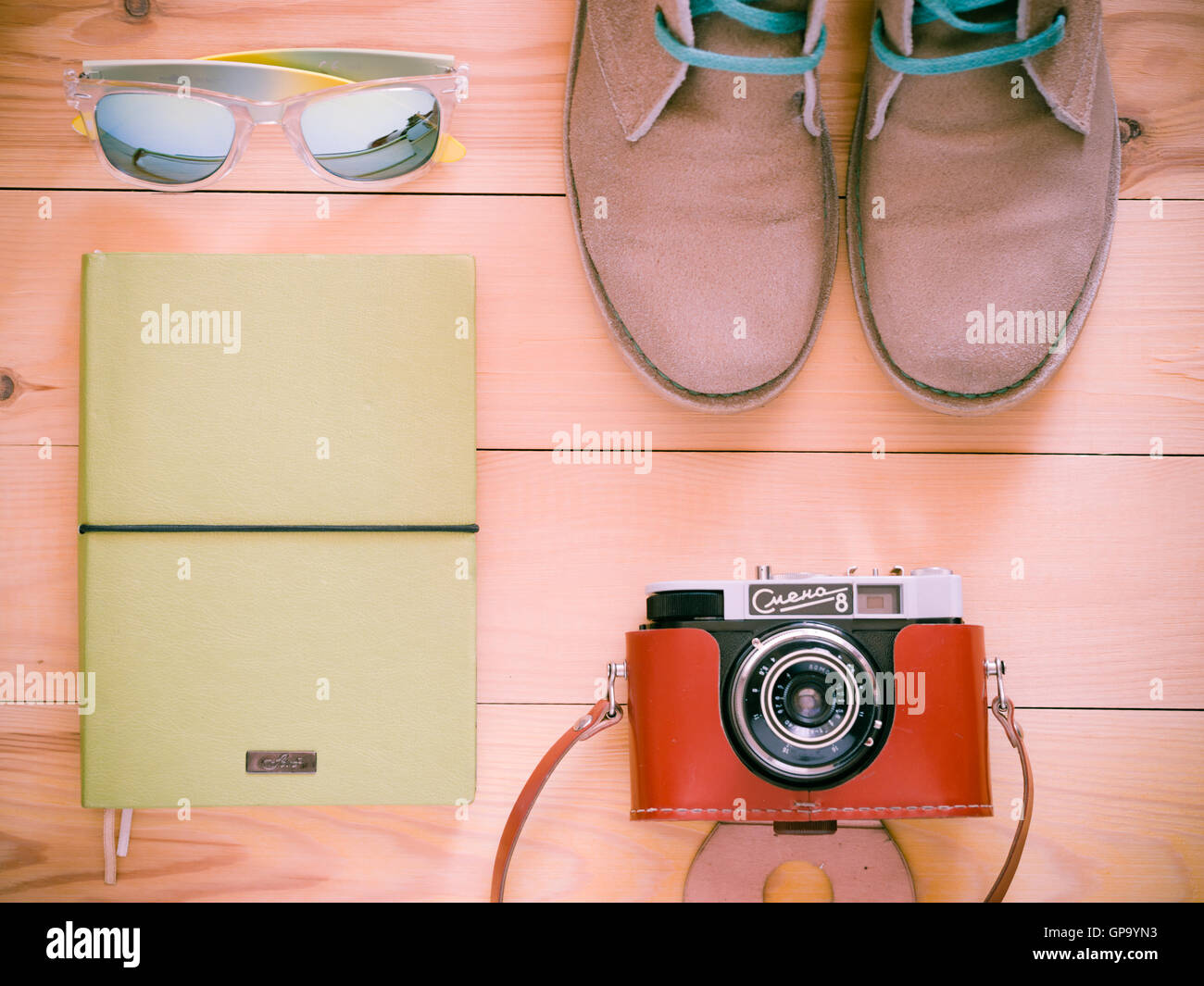 top view set with old camera, boots, sunglasses Stock Photo - Alamy