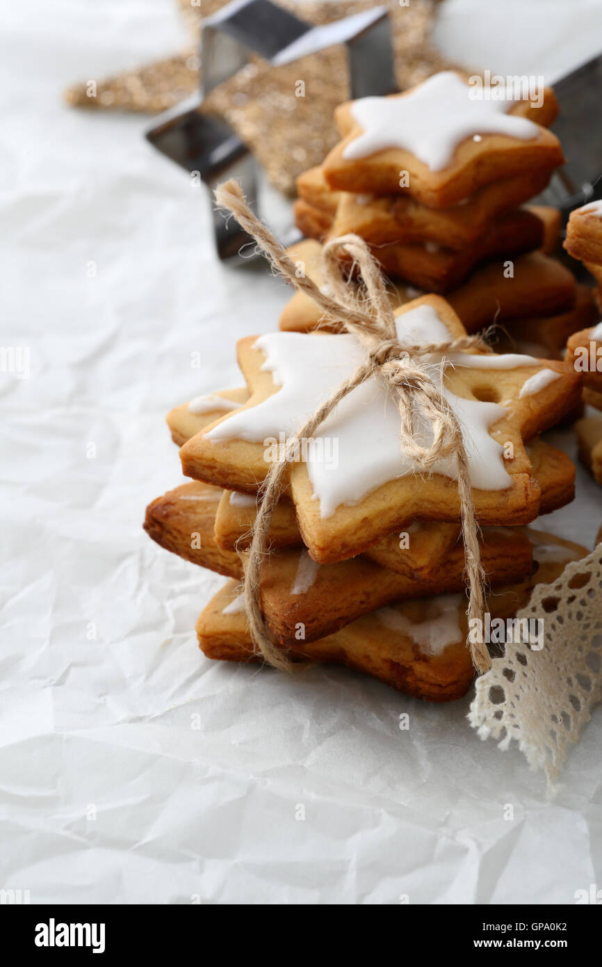 Stack of Gingerbread star cookies with icing, food close-up Stock Photo ...