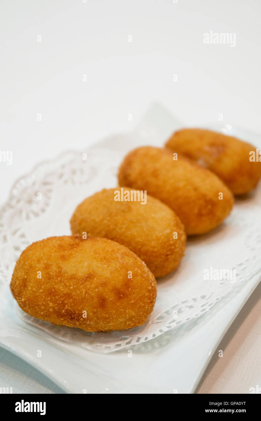 Croquettes serving. Close view Stock Photo - Alamy