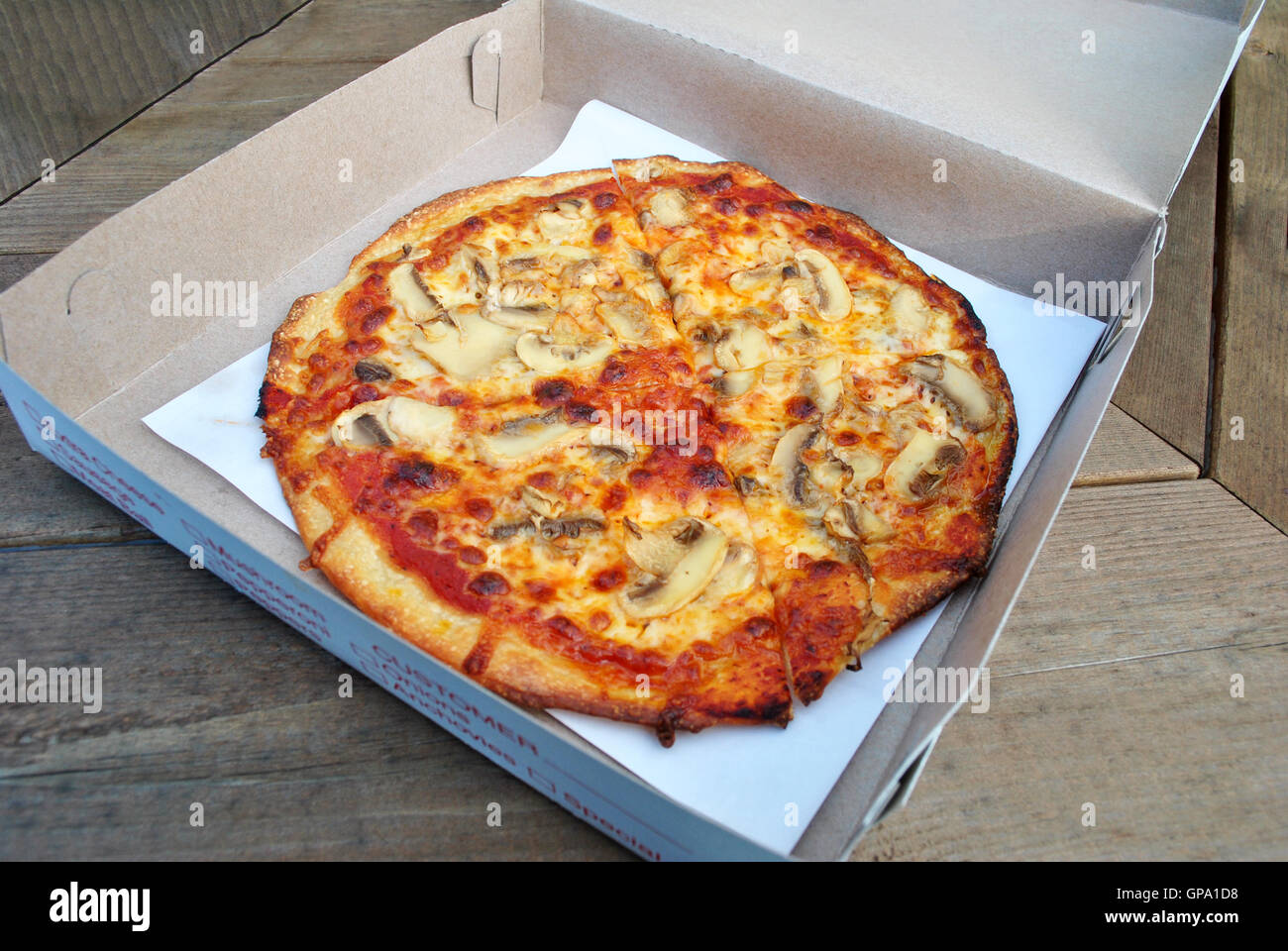 Mushroom Pizza in a Take Out Box Stock Photo - Alamy
