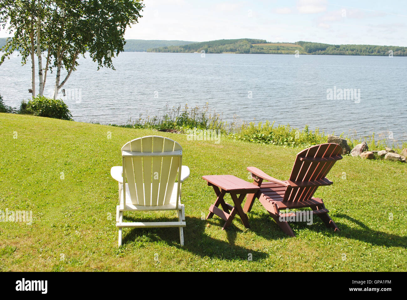 Two wooden chairs facing hi-res stock photography and images - Alamy