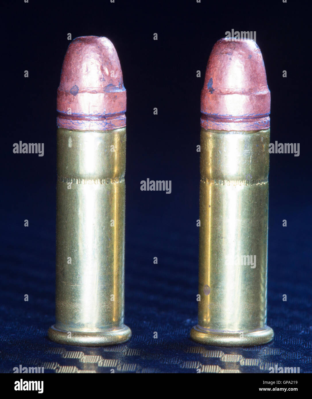 Copper plated bullets on shells designed for use in rimfire guns Stock ...