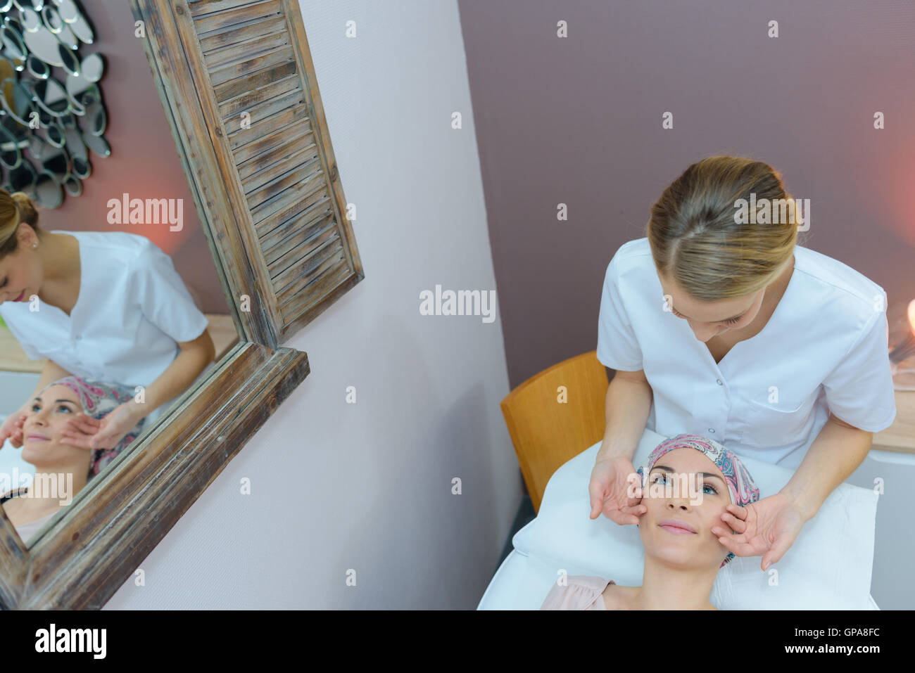 young beautiful woman in spa environment taken care of Stock Photo - Alamy