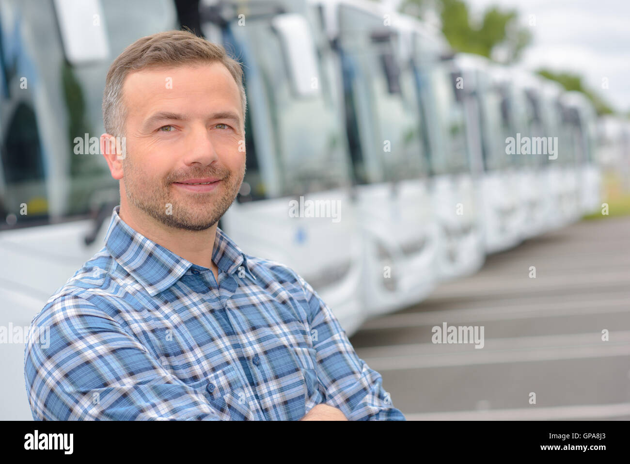 man and buses Stock Photo - Alamy