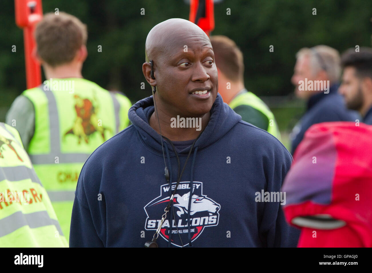 Afro Caribbean coach looks mildly surprised Stock Photo - Alamy