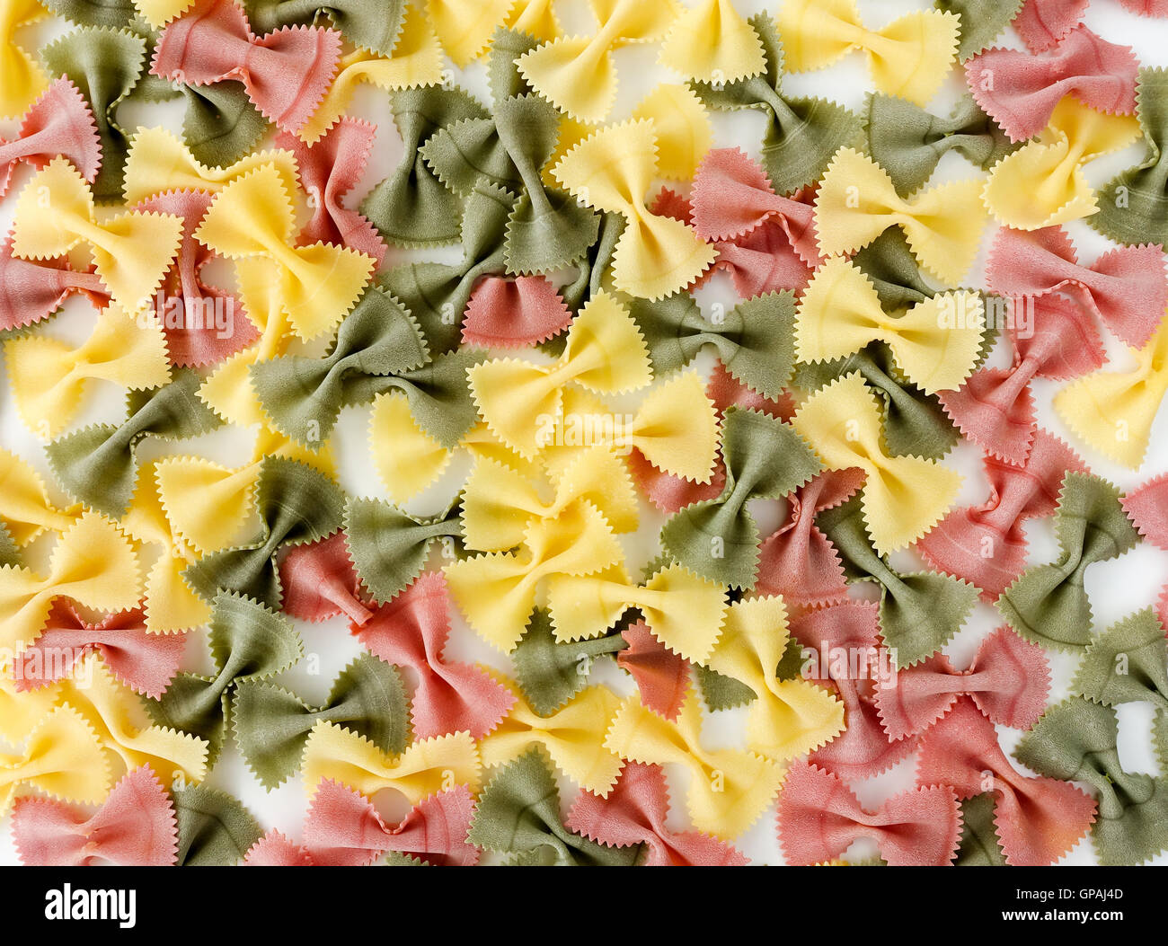 Multicolored Farfalle Pasta on White Background Stock Photo - Alamy