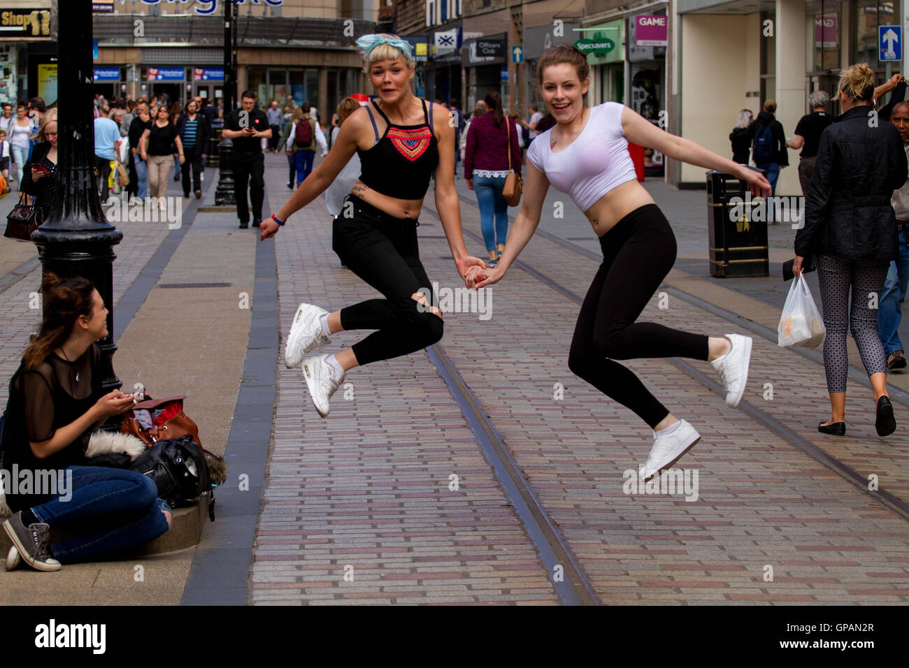 Happy women jumping hi-res stock photography and images - Alamy