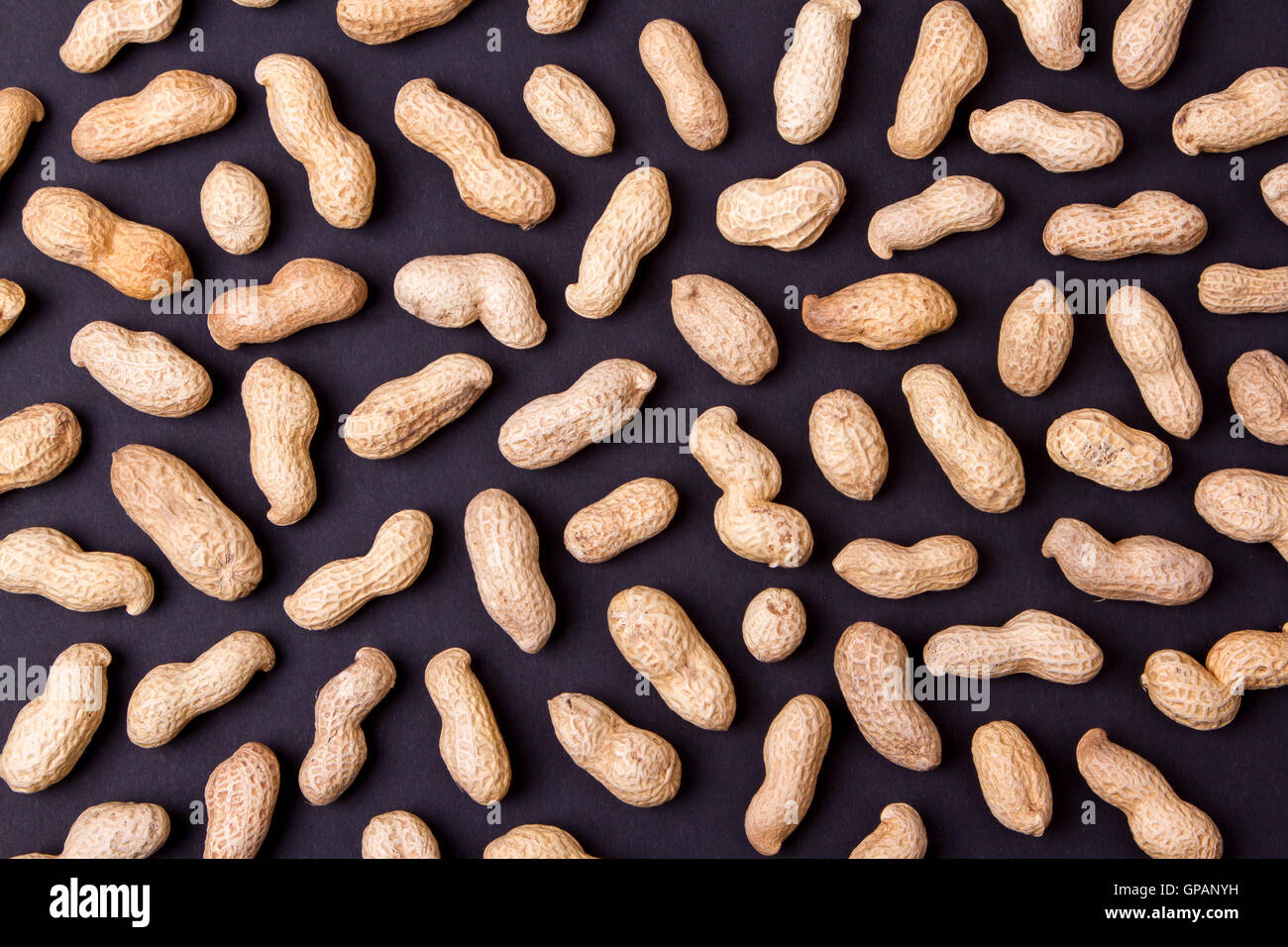Roasted in-shell peanuts Stock Photo - Alamy