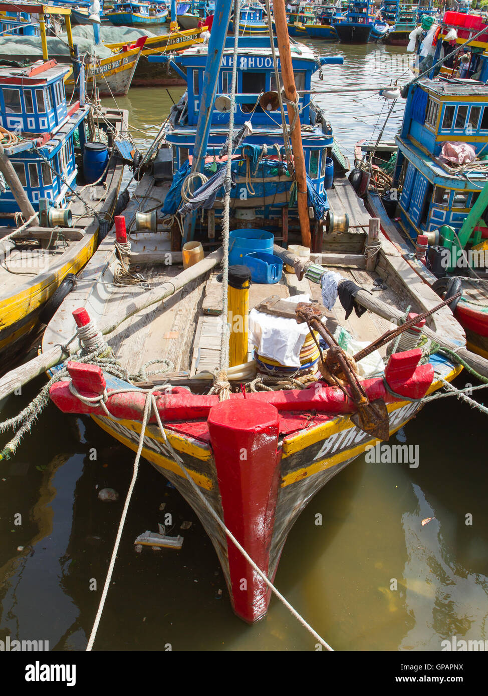 Fishing boats in a harbour Stock Photo - Alamy