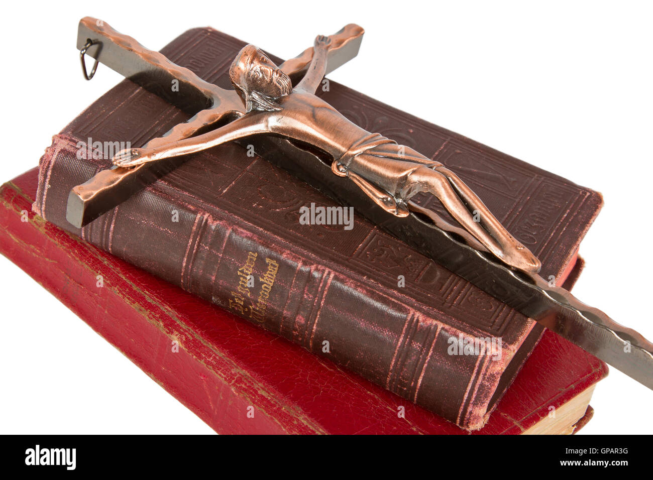 Old antique bible and cross on a white background Stock Photo - Alamy