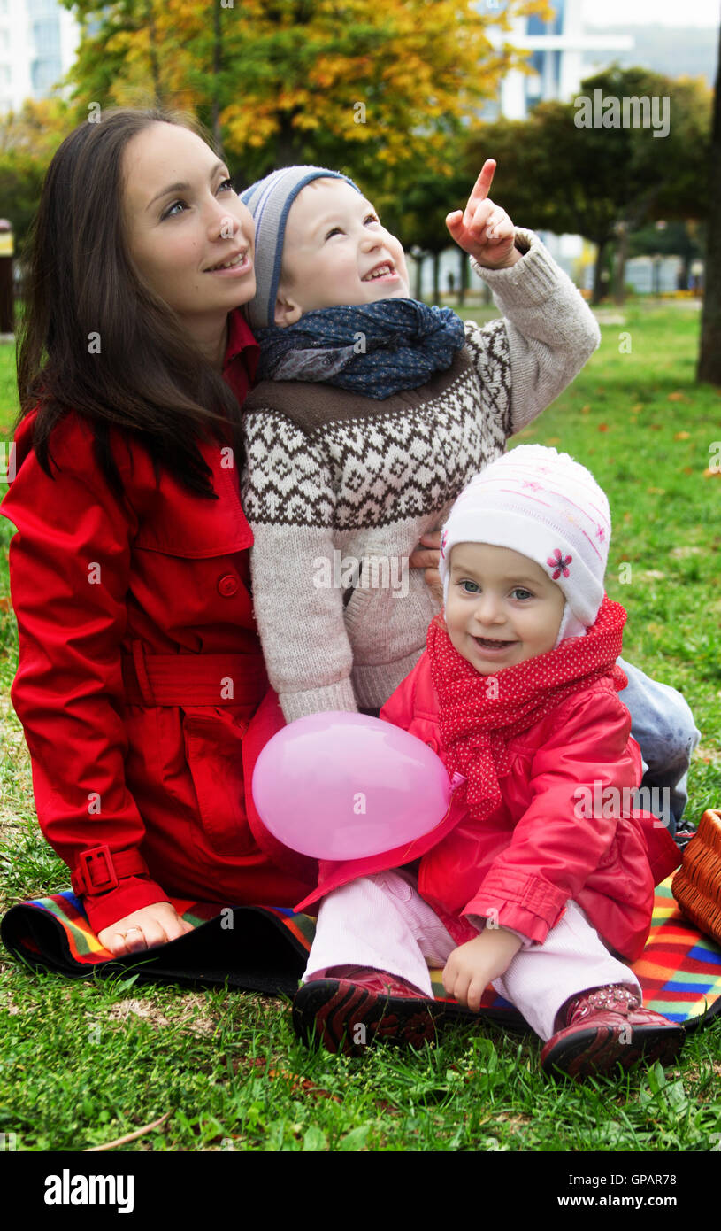 Mother and two lovely children Stock Photo - Alamy