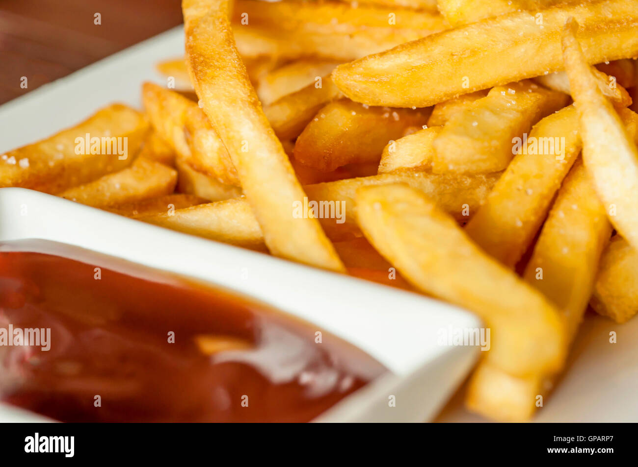 French Fries with Barbecue dipping Stock Photo - Alamy
