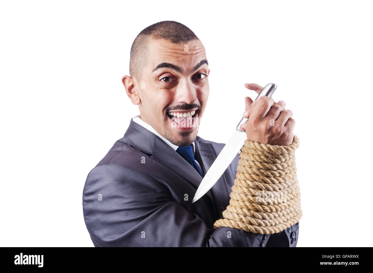 Businessman tied up with rope Stock Photo - Alamy
