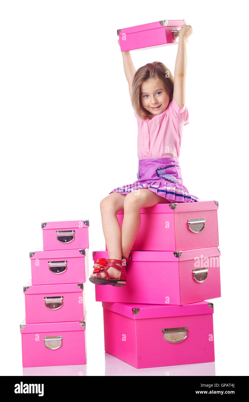 Little cute girl with lots of boxes Stock Photo - Alamy