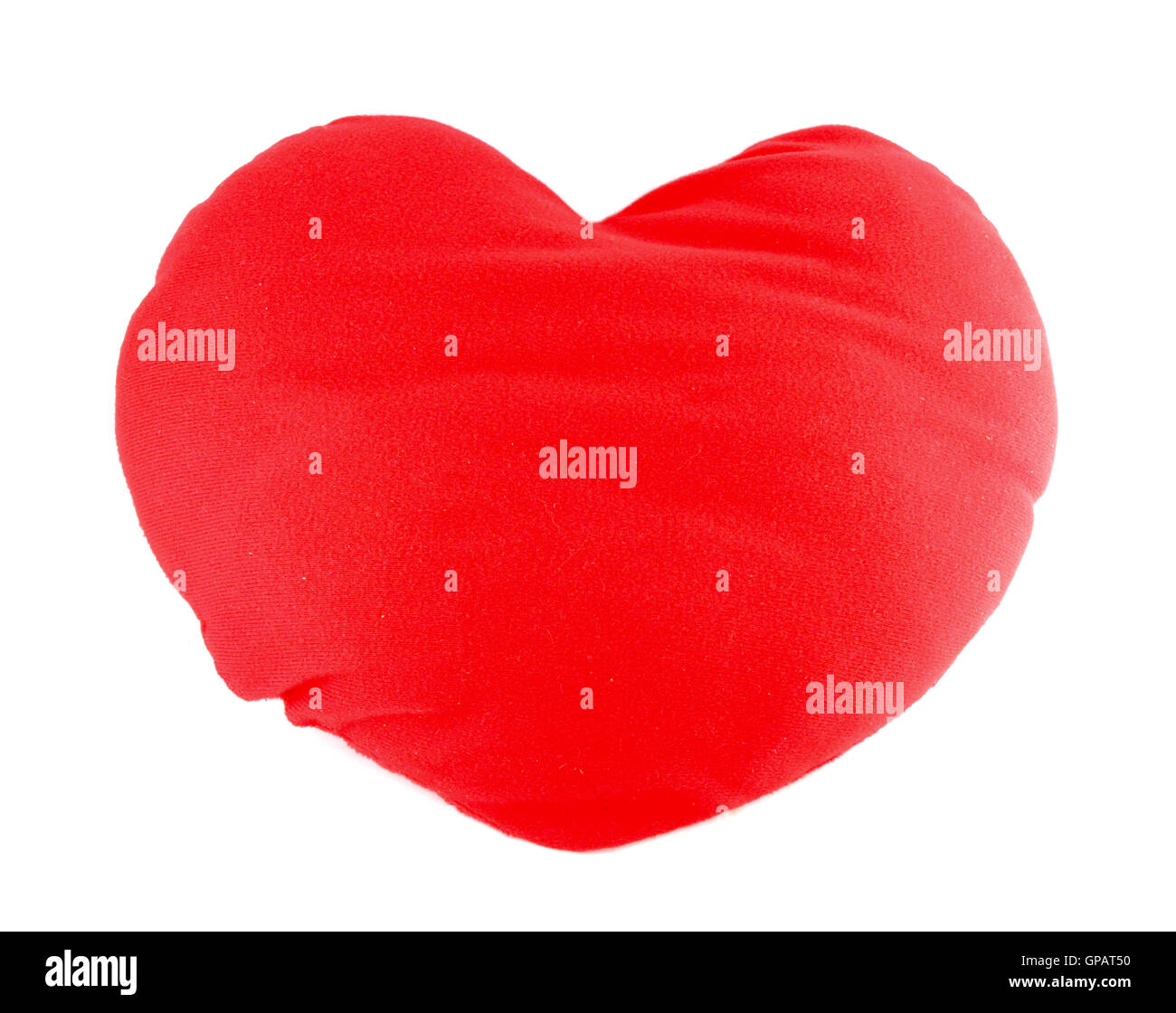 Soft red heart pillow on white background Stock Photo - Alamy