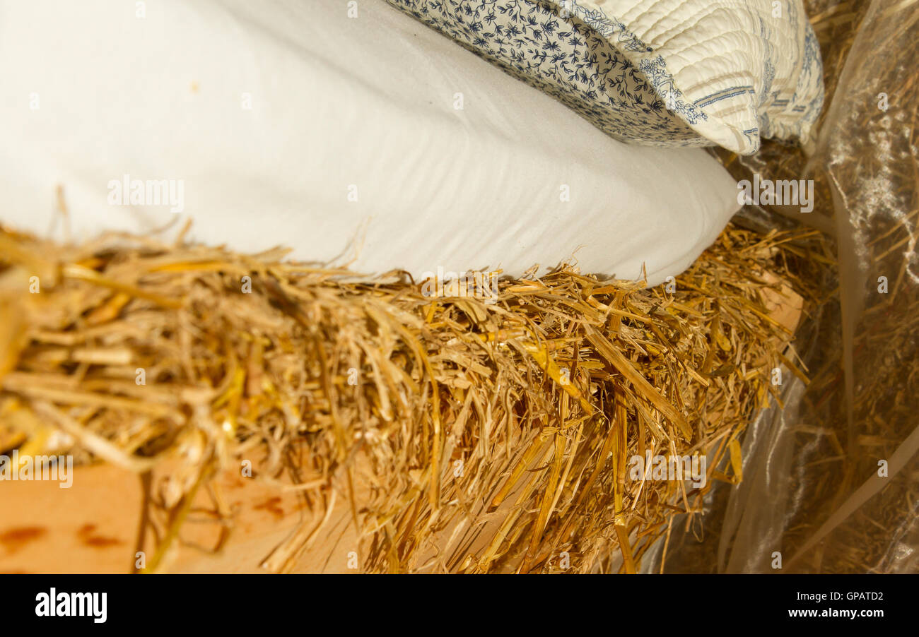 Bed on top of a haystac Stock Photo - Alamy