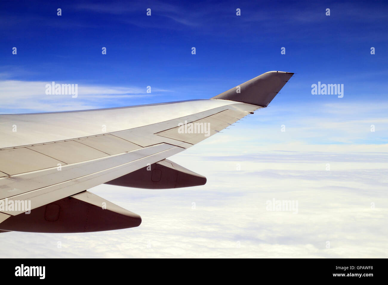 blue sky and airplane wing viewing from a plane Stock Photo - Alamy
