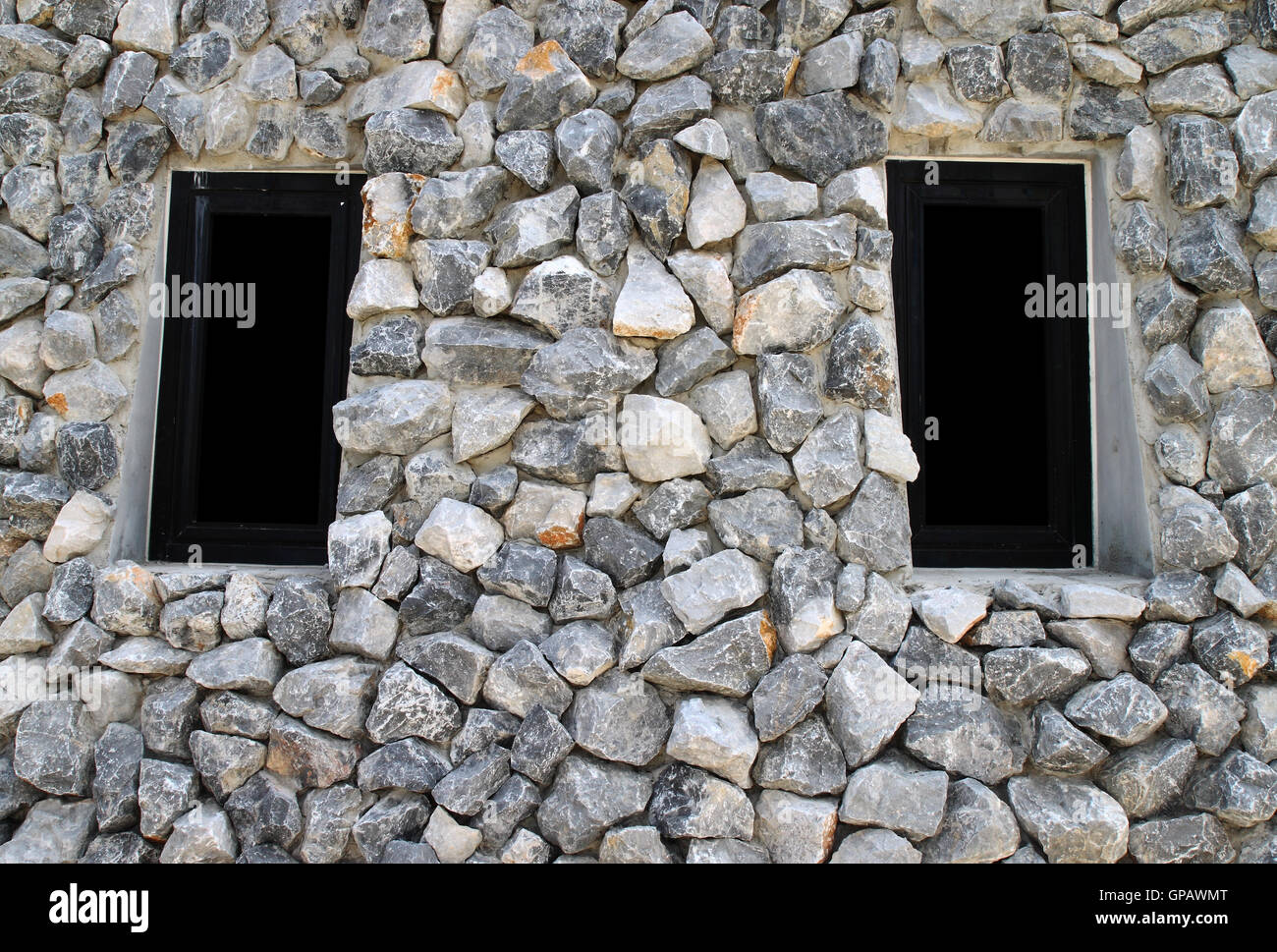 window on stone wall texture Stock Photo - Alamy